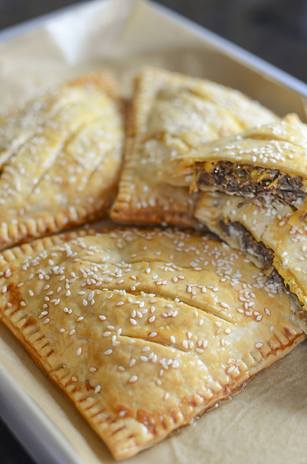 Beef and Cheddar Hand Pies - Simple comfort food in a golden crust!
